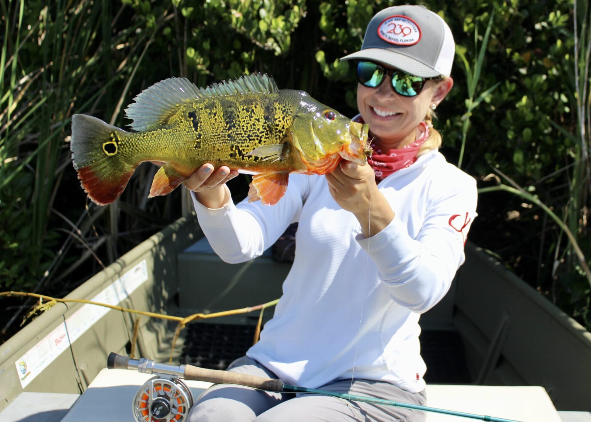 Debbie Hanson with peacock-bass | Brooks Fishing Club